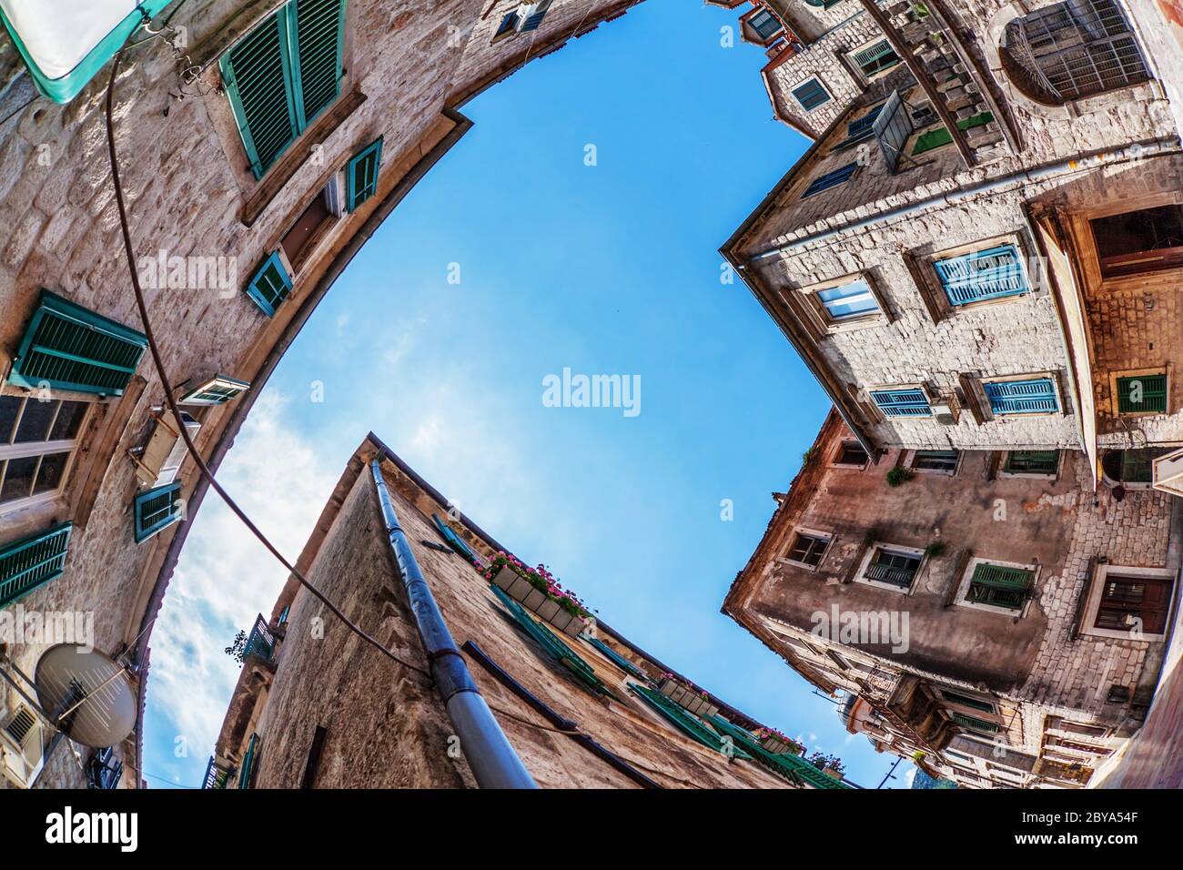 Fish-eye view of the old city on sky background Stock Photo - Alamy