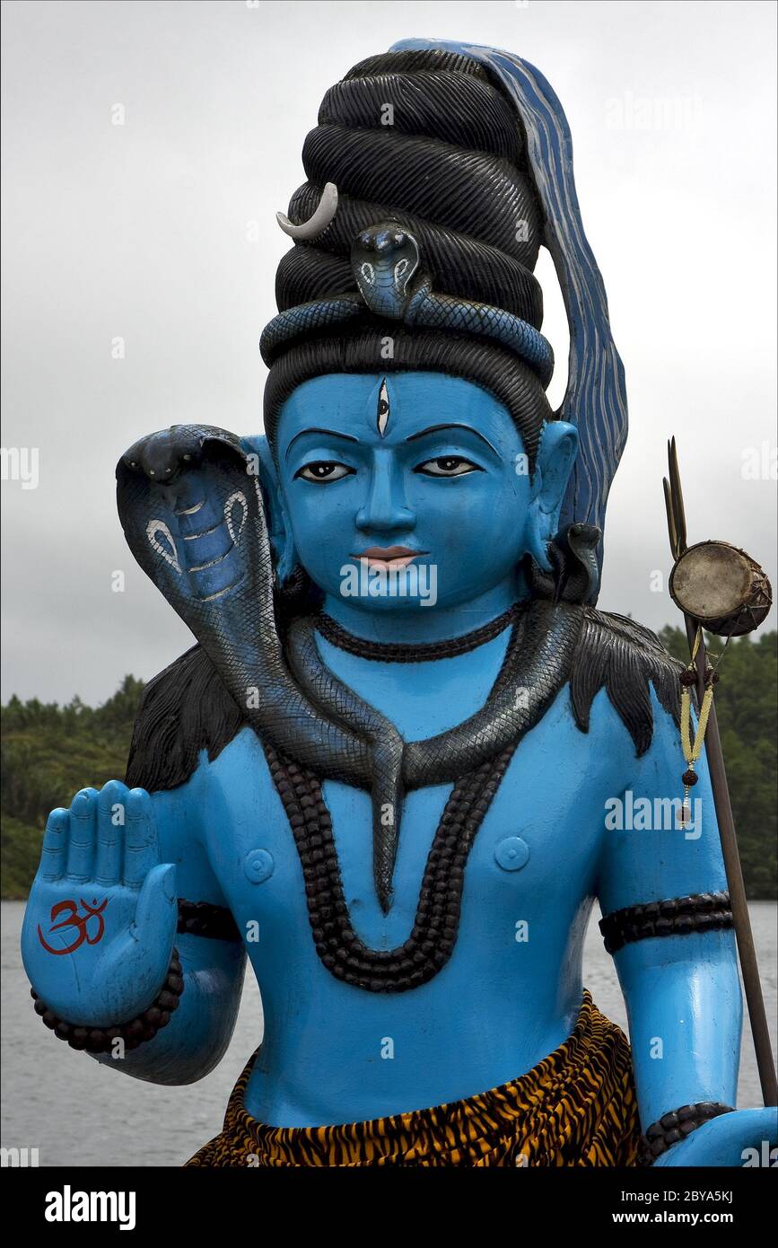 blue wood statue of Hinduism Stock Photo - Alamy