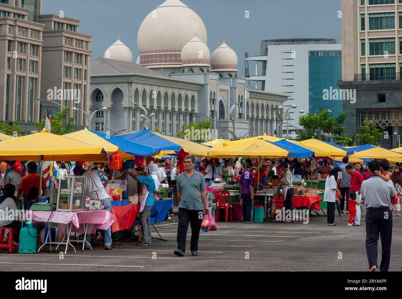 Crowds buying food at the hawker stalls during Ramadan at Putrajaya in ...