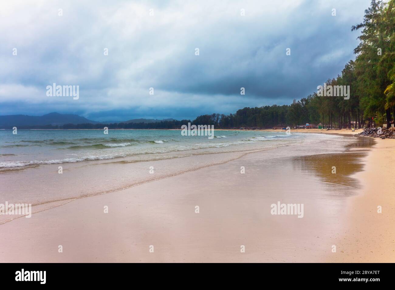 tropical beach under gloomy sky Stock Photo - Alamy