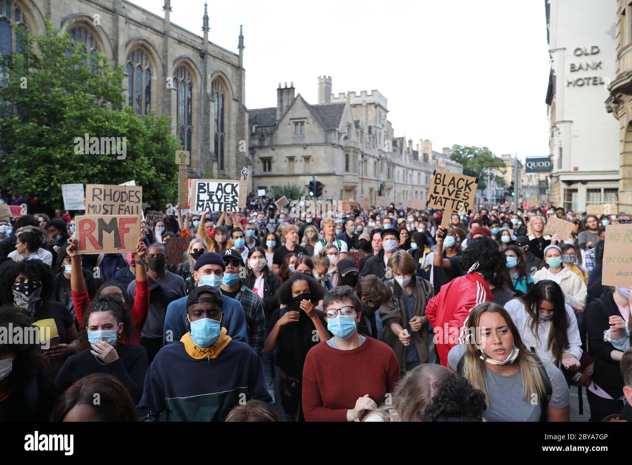 People during a protest calling for the removal of the statue of 19th ...