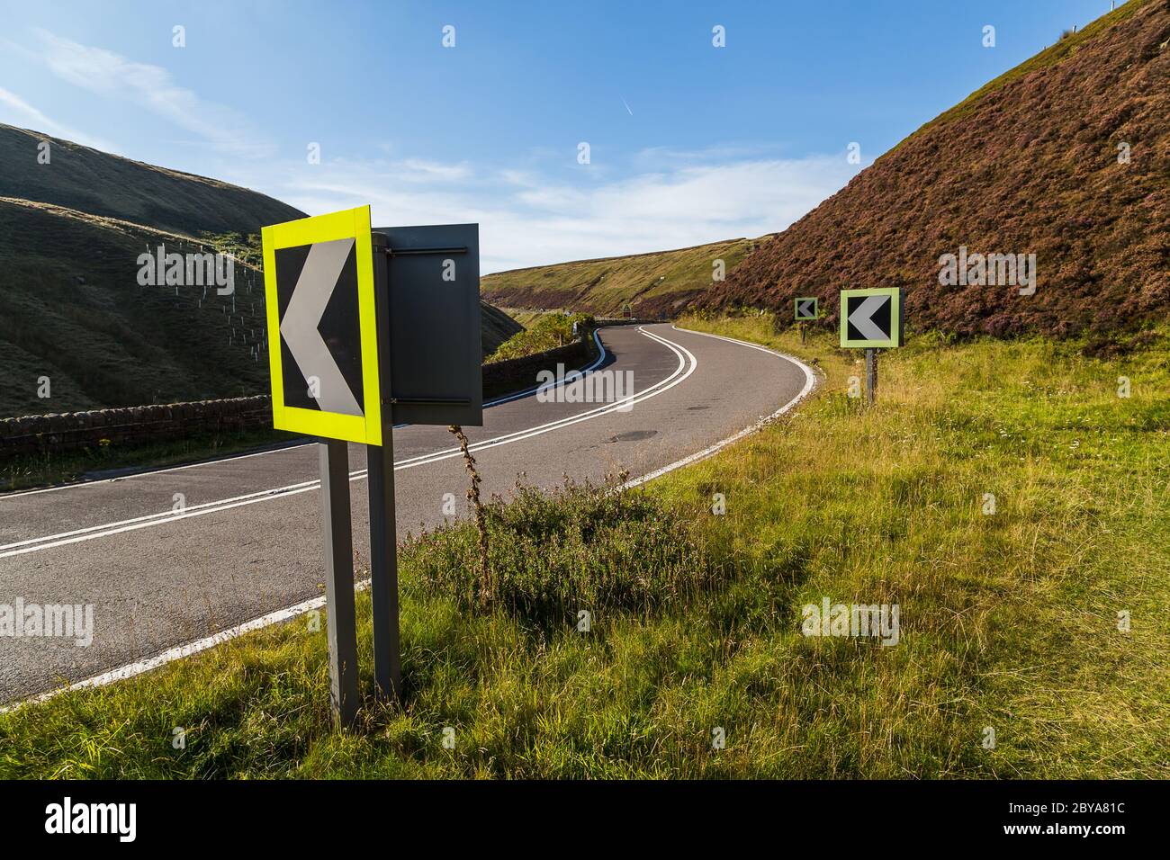 Arrows face left to warn of a bend in the Snake Pass between Sheffield ...