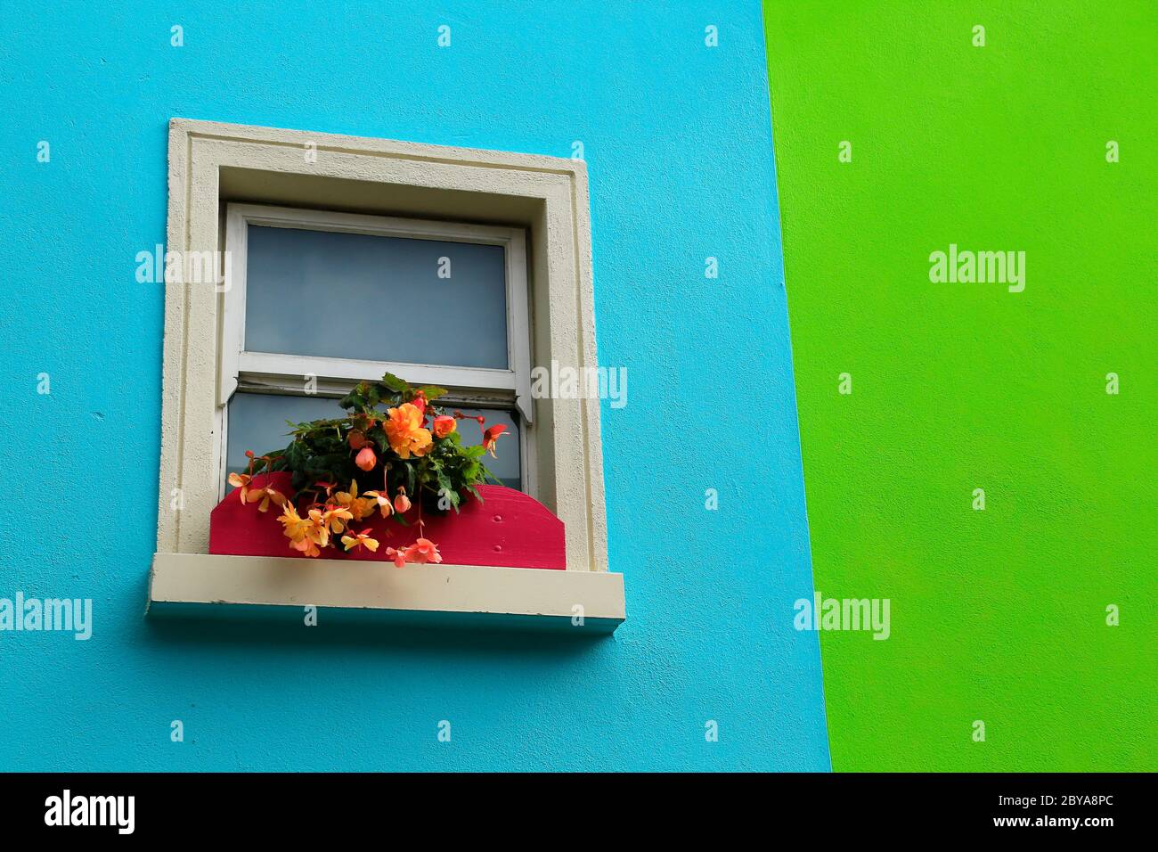 Brightly painted Irish houses and windows in Kinsale, County Cork ...