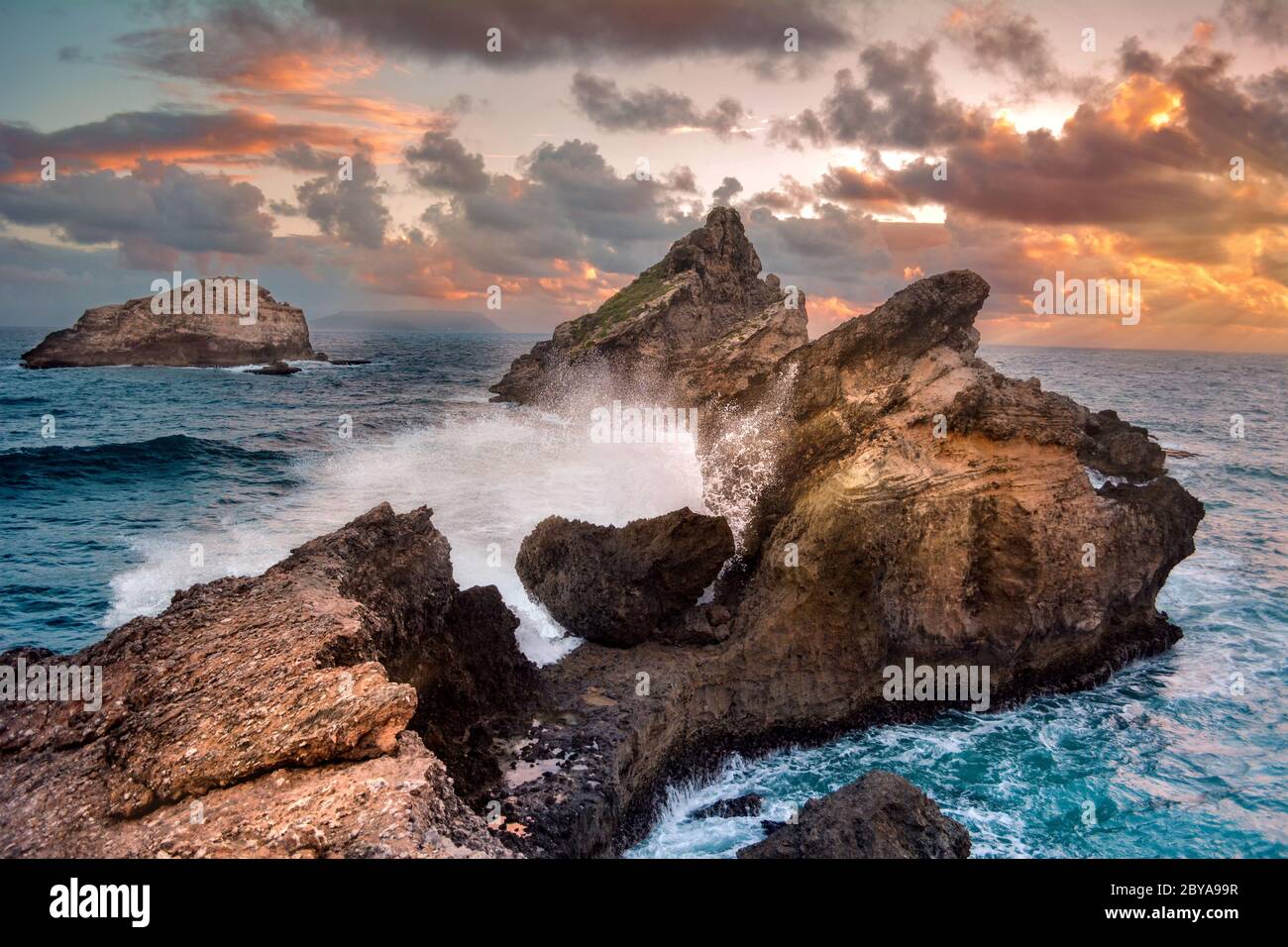 Cloudy and shiny sunrise over the stormy sea Stock Photo - Alamy