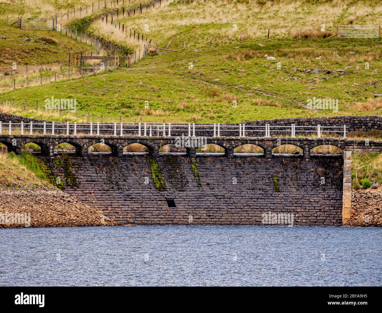 Weir and footbridge on the north edge of Castleshaw Upper Reservoir ...