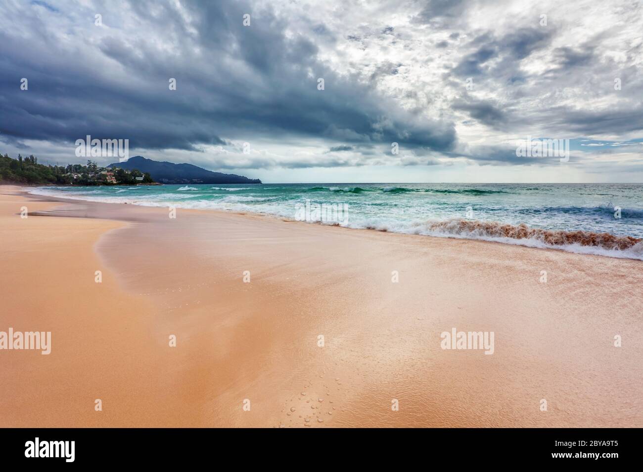 tropical beach under gloomy sky Stock Photo - Alamy