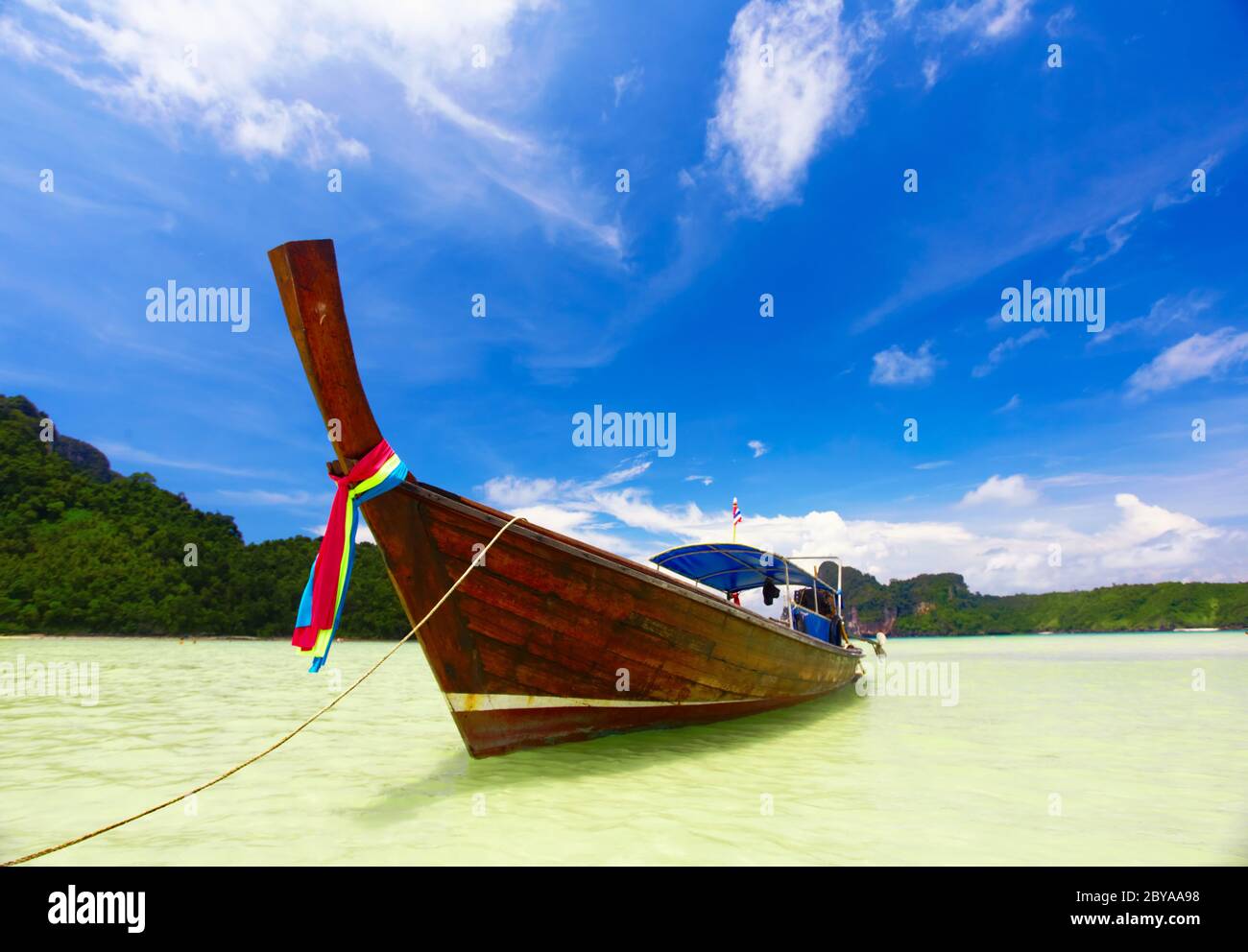 Boat in the tropical sea Stock Photo - Alamy