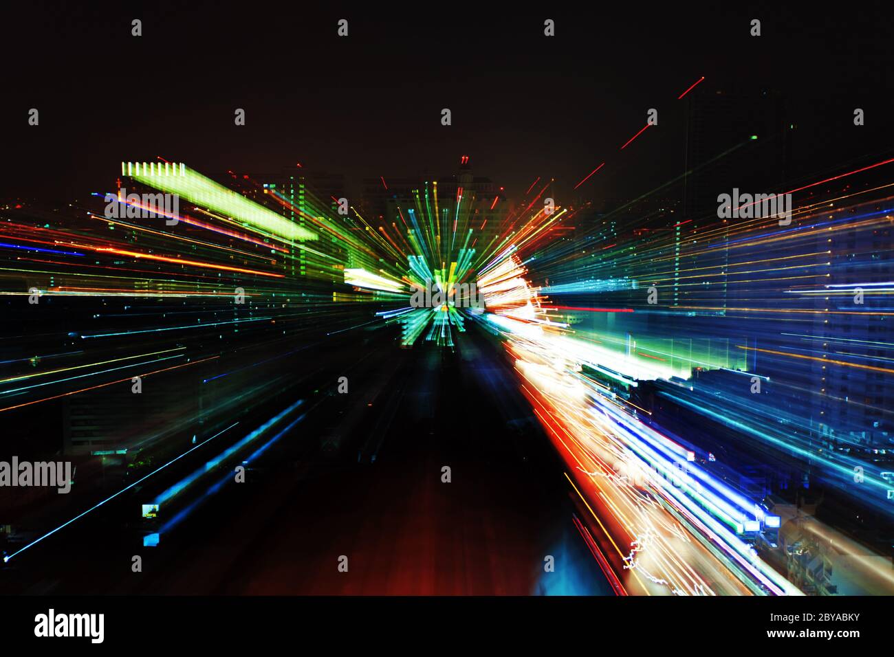 Fast moving lights blurred over modern city background Stock Photo - Alamy