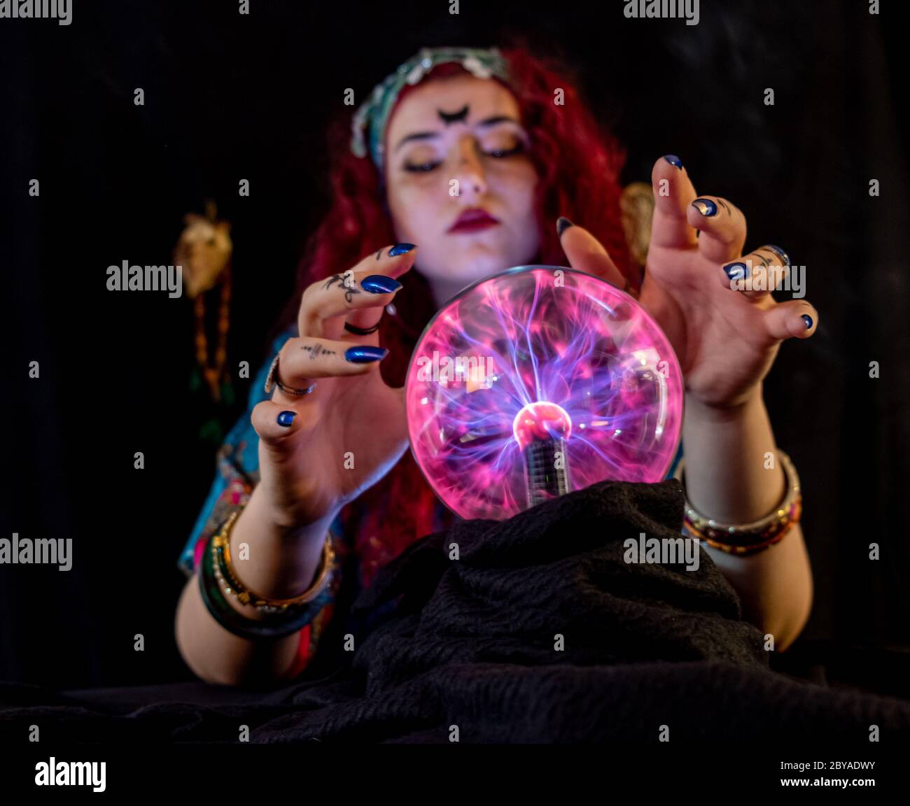 Female fortune teller with crystal ball hi-res stock photography and ...
