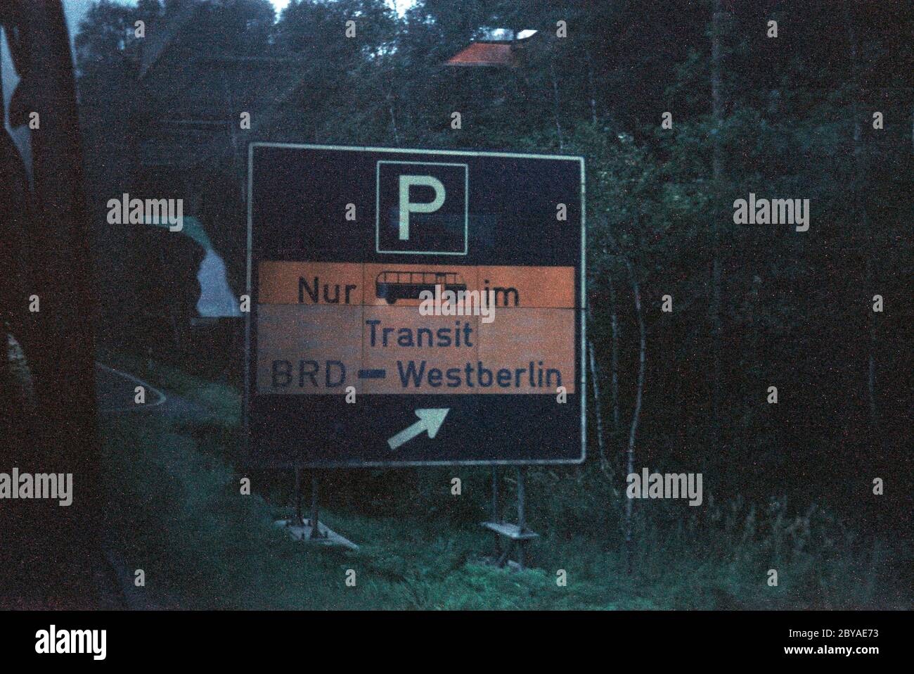 road sign on the motorway indicating a car park solely for transit ...
