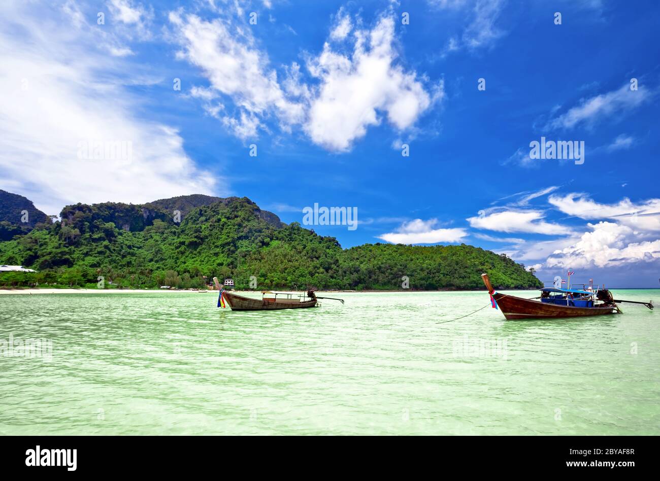 Boat in the tropical sea Stock Photo - Alamy