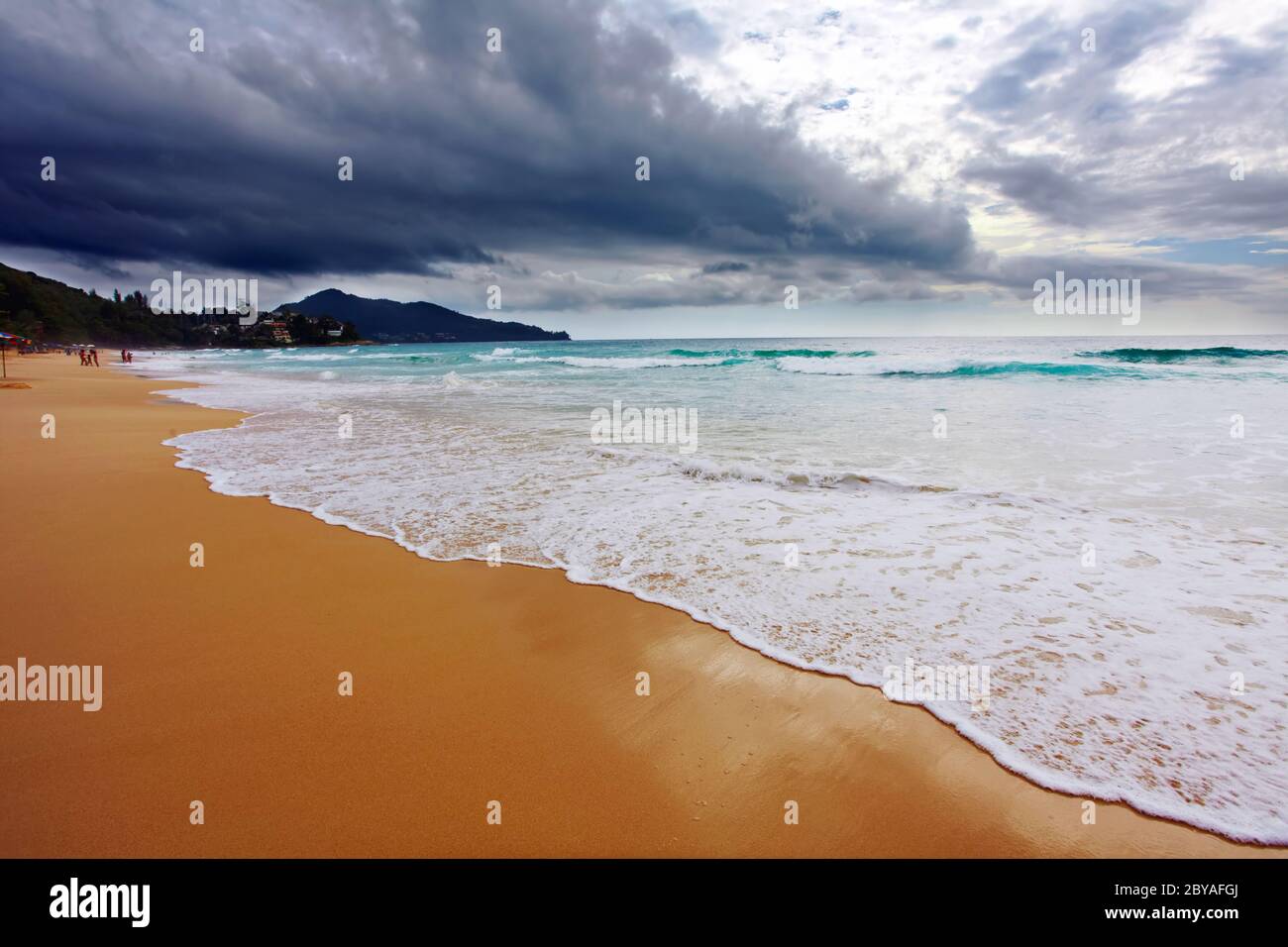 tropical beach under gloomy sky Stock Photo - Alamy
