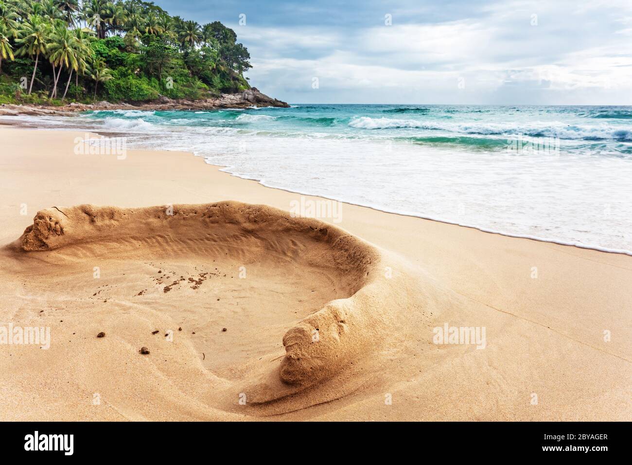 Tropical beach under gloomy sky hi-res stock photography and images - Alamy