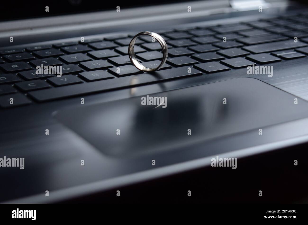 STARGATE: A gold ring appears on the keyboard of a laptop computer ...
