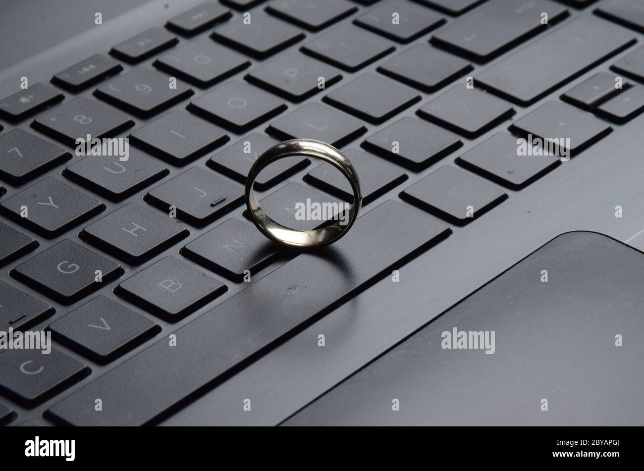 STARGATE: A gold ring appears on the keyboard of a laptop computer ...