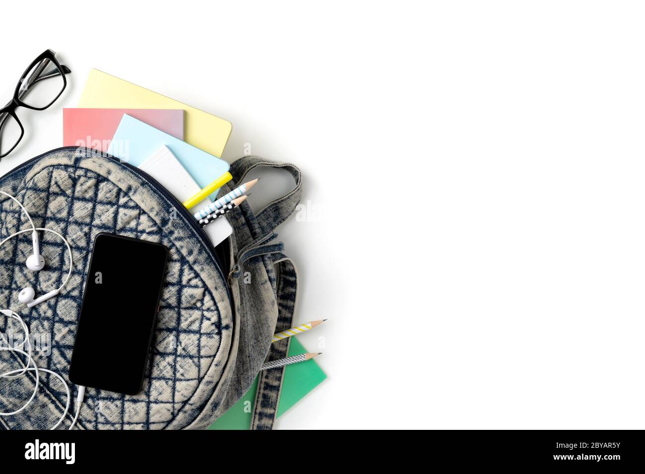 Flat lay top view backpack with different colorful stationery Stock ...