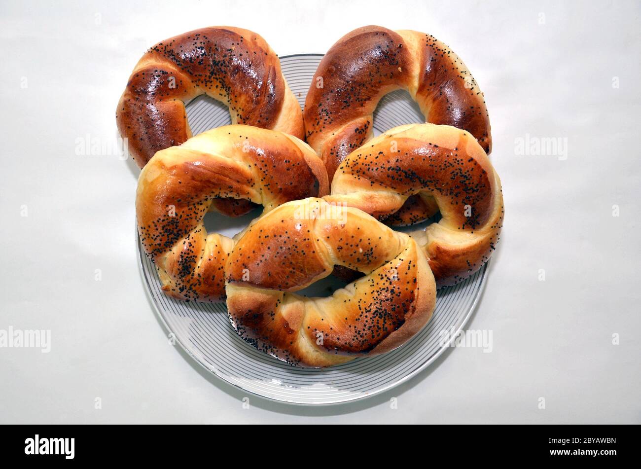 Russian national cuisine . Bagel with poppy seeds isolated on white ...