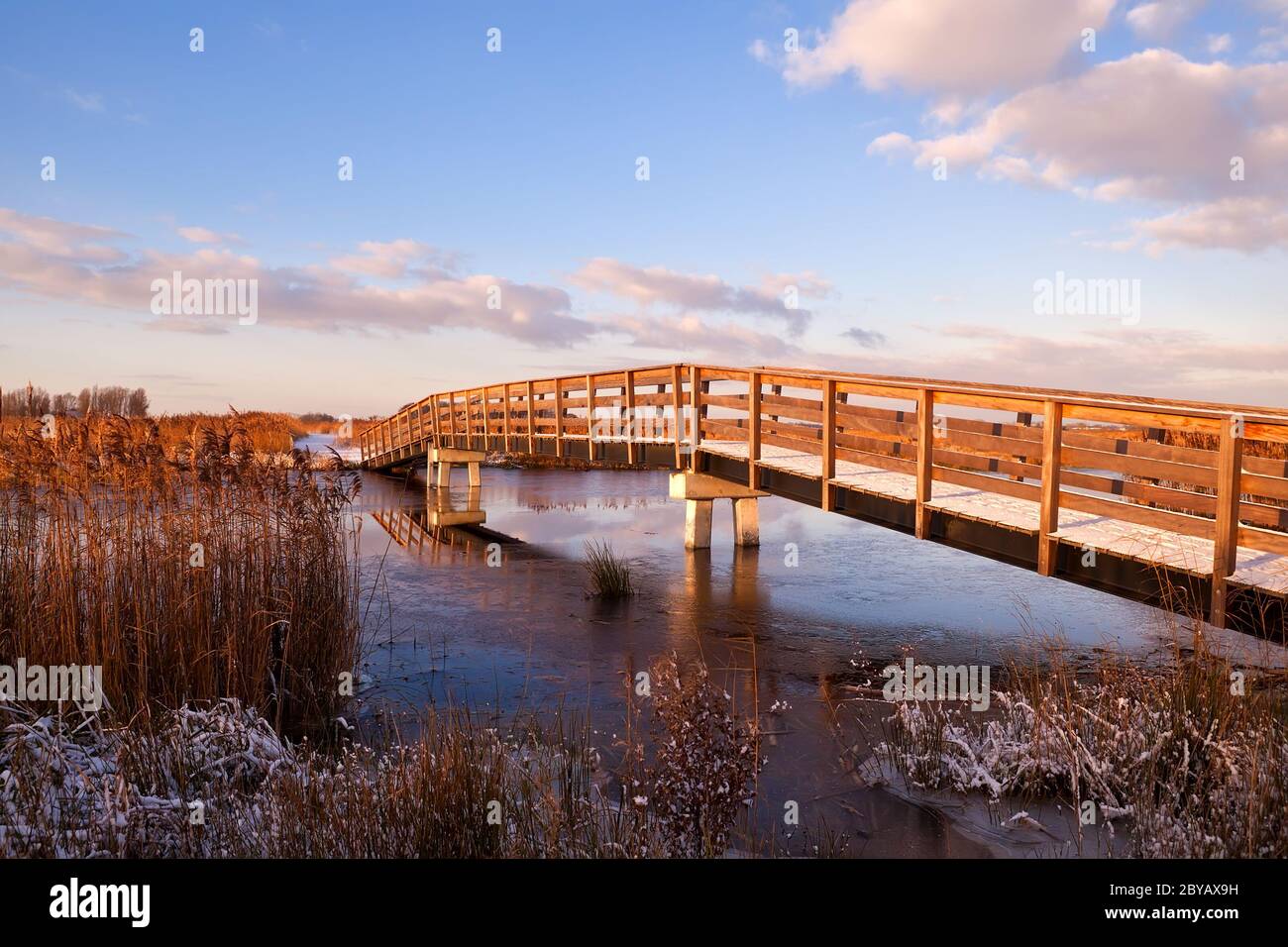 Wooden bridge over frozen river hi-res stock photography and images - Alamy