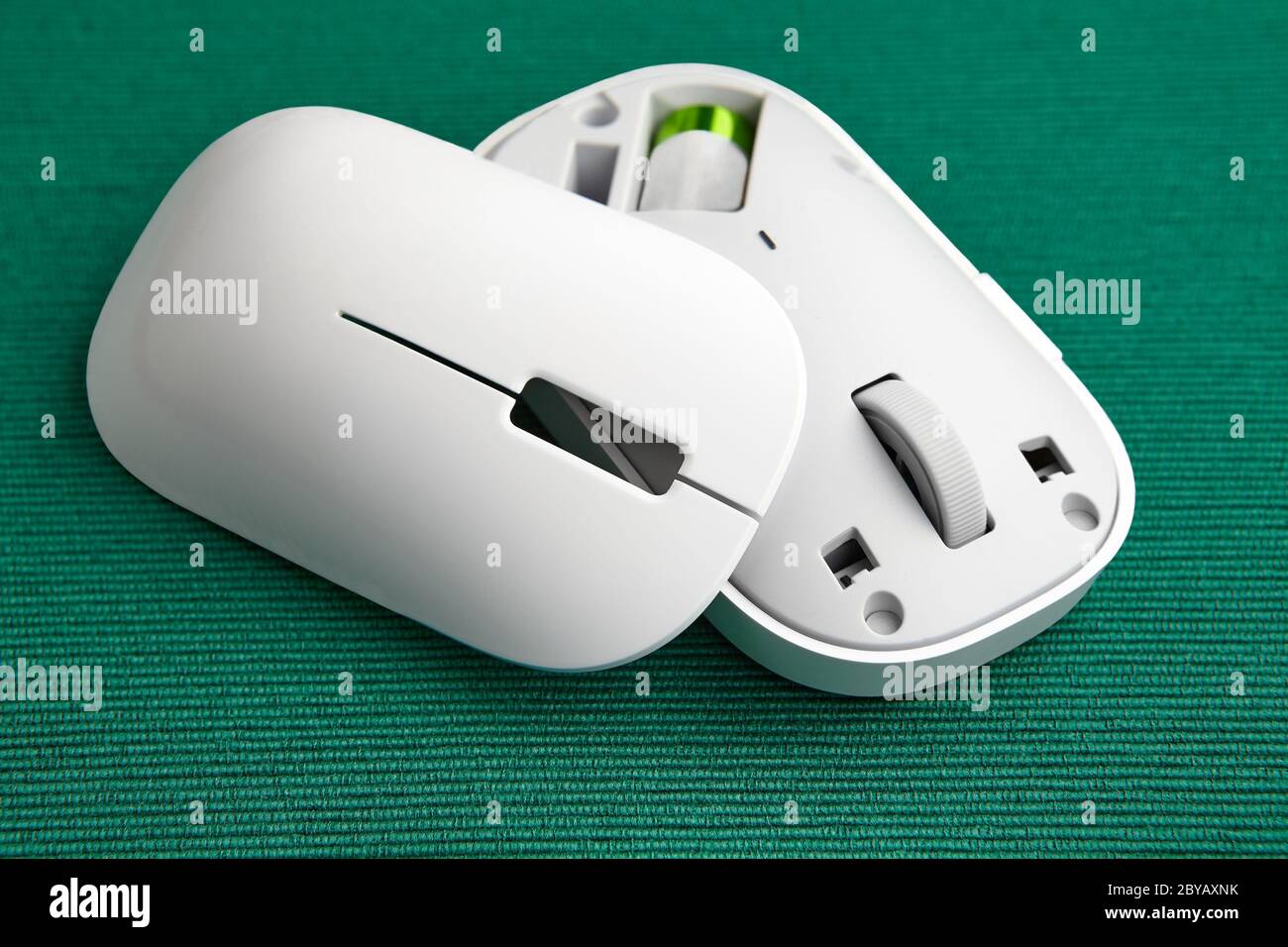 Wireless computer mouse with a magnetic cover. Disassembled input ...