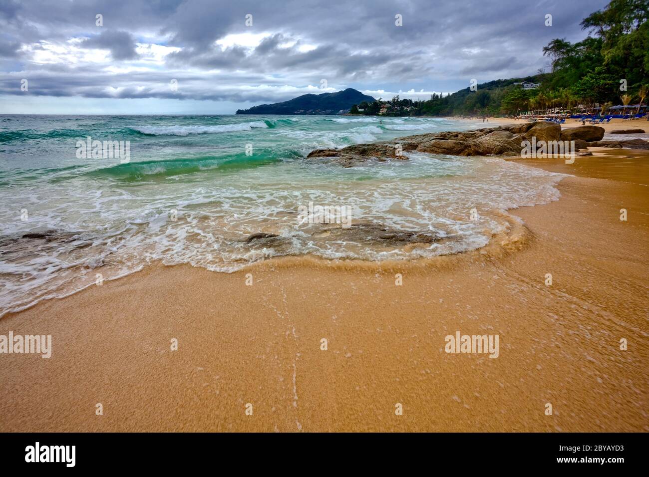 tropical beach under gloomy sky Stock Photo - Alamy