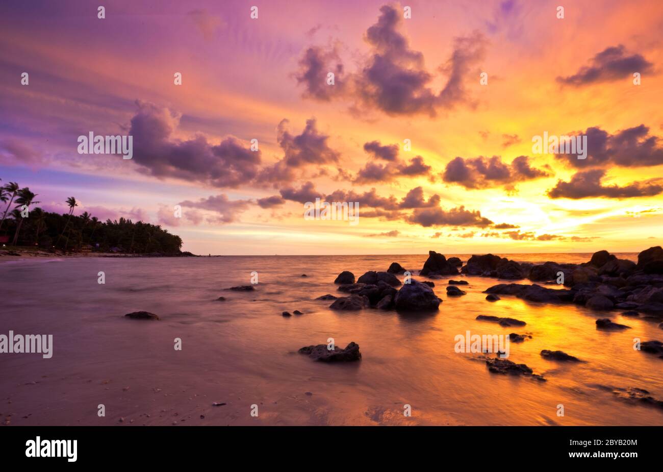 Tropical colorful sunset Stock Photo - Alamy