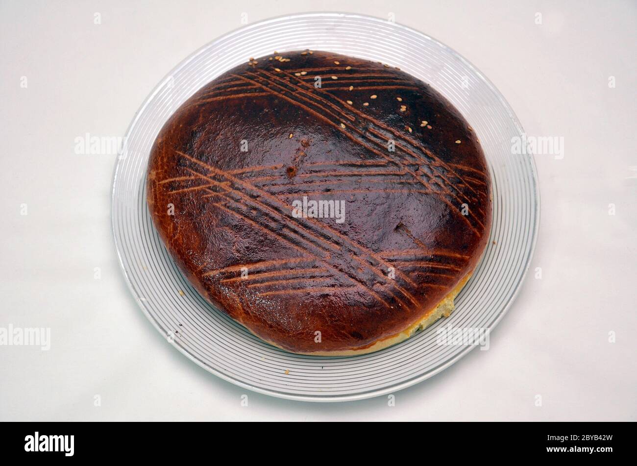 whole and sliced cakes . traditional sweet gata white backgrounds ...