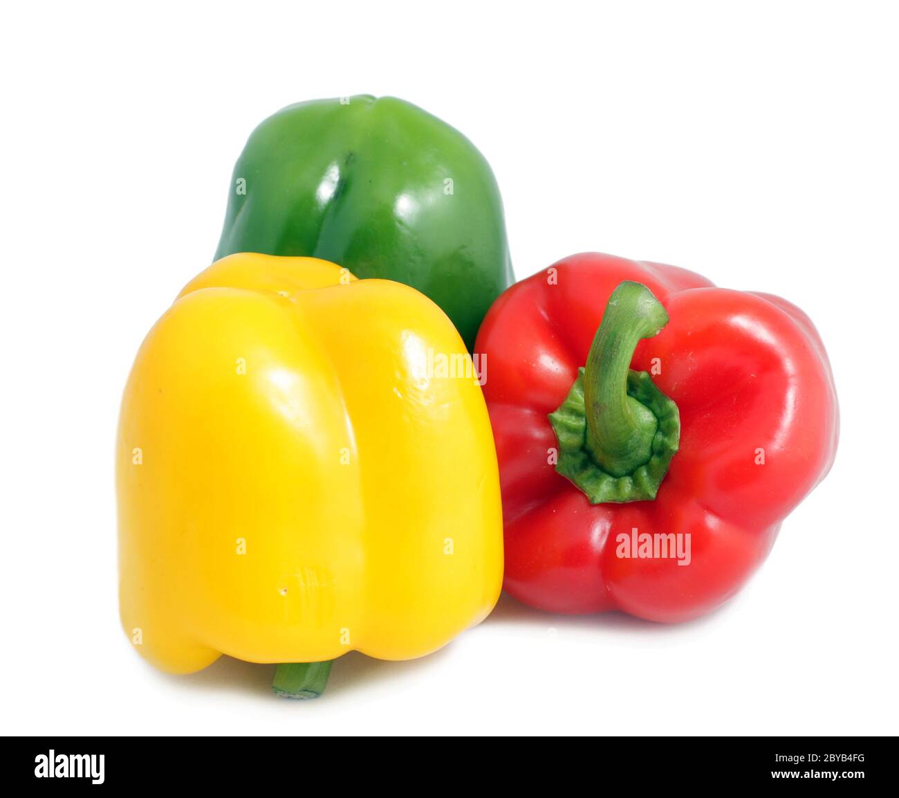 Three sweet bulgarian peppers Stock Photo - Alamy