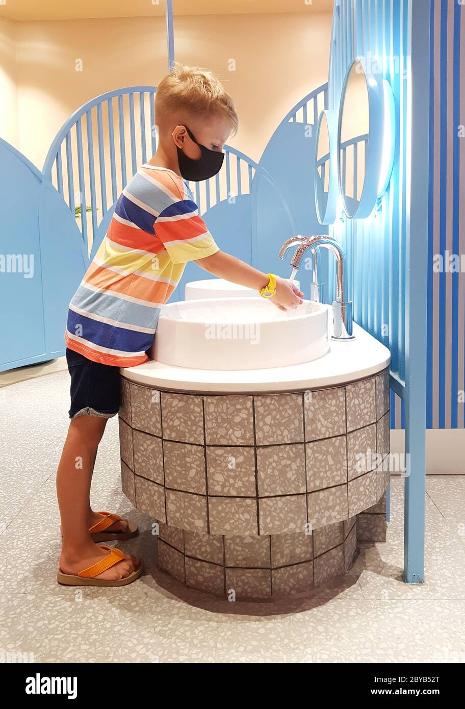 Boy washing face hi-res stock photography and images - Alamy