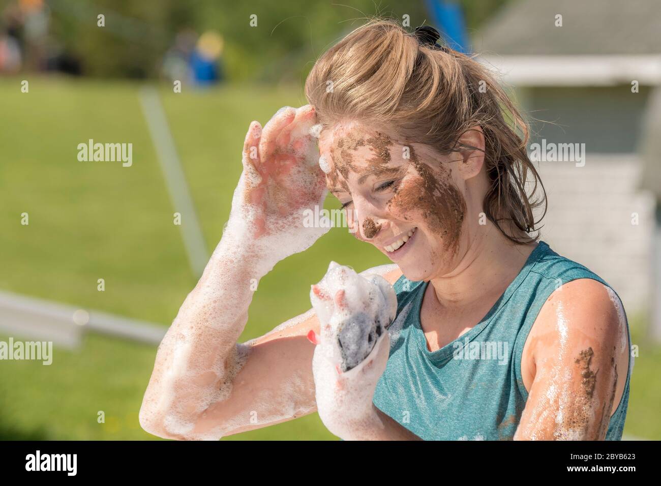 Woman covered in mud hi-res stock photography and images - Alamy