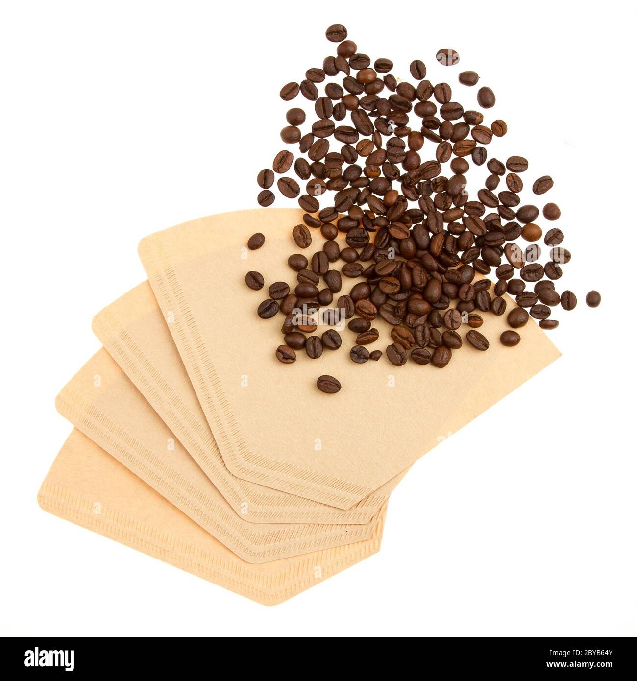Coffee beans on a coffee filter (white background Stock Photo - Alamy