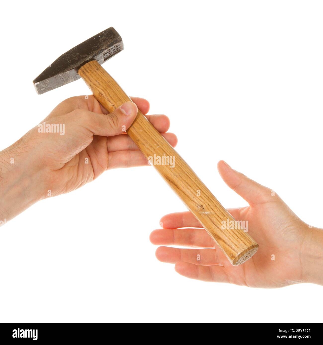 Man giving woman hammer Stock Photo - Alamy
