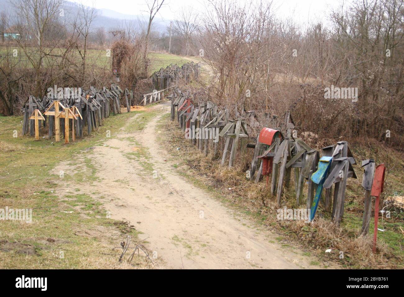Aninoasa village, Gorj County, Romania. Crosses by the side of the road ...