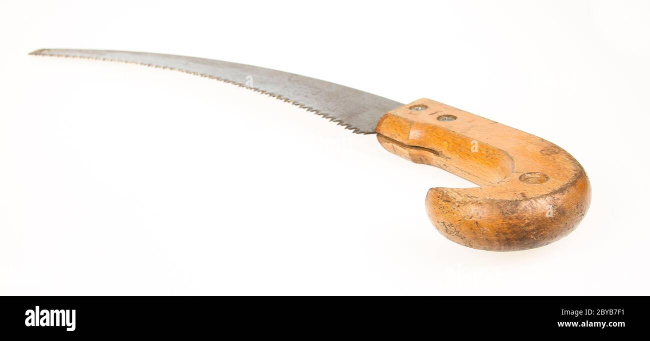 Old rusty toy hand saw on white Stock Photo - Alamy