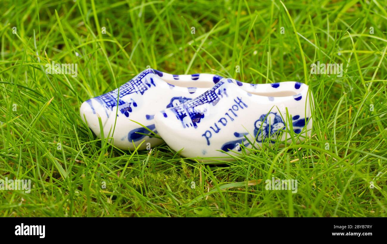 Pair of small porcelain clogs from Holland Stock Photo - Alamy
