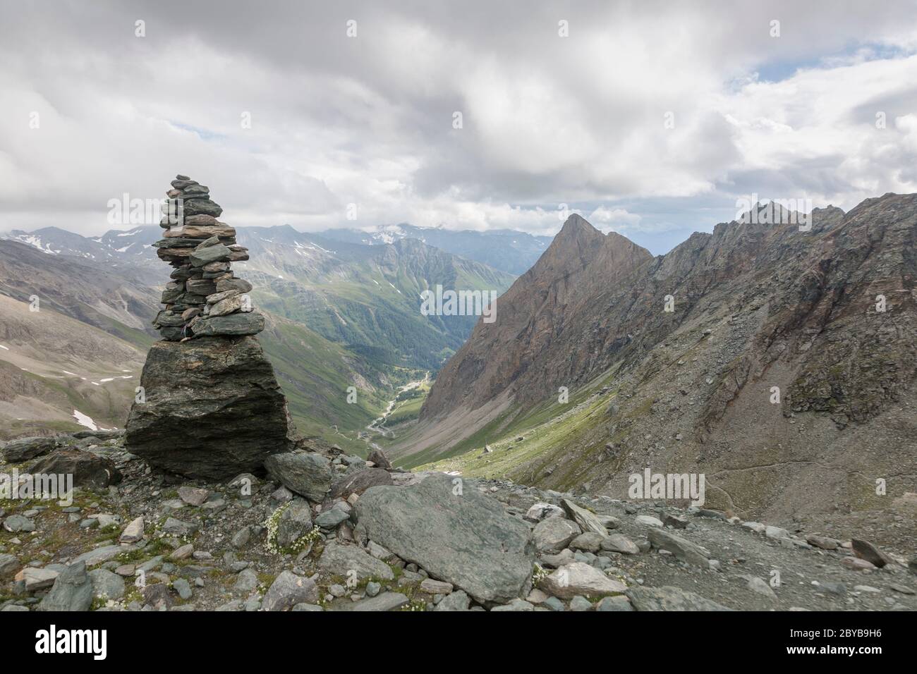 The stone pillar on a climbing route to Grossglockner rock summit in ...
