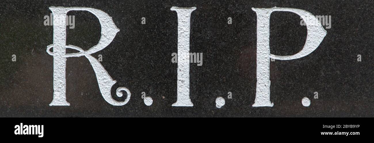 The letter RIP on a grave Stock Photo - Alamy