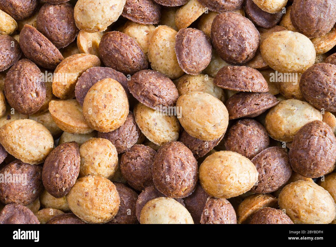 Closeup of sweet nutty shortbread cookies as culinary background. Heap ...