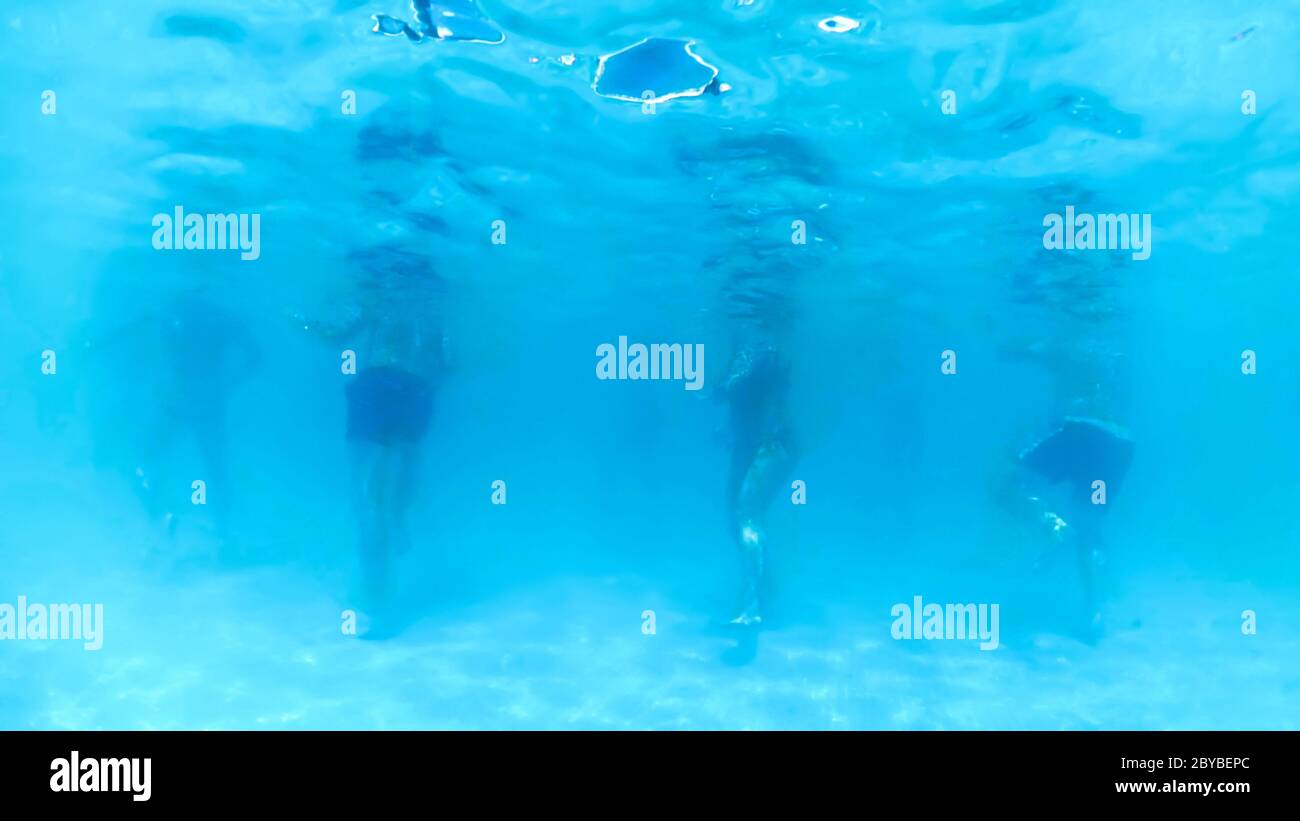 Underwater image of big crowd relaxing and having fun in outdoor ...
