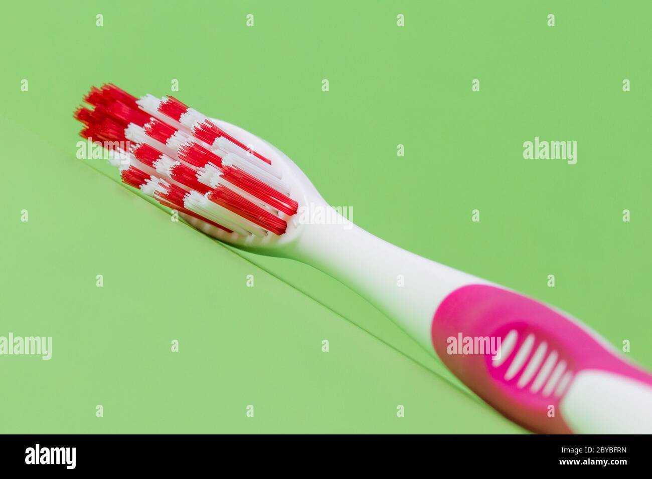 A pink toothbrush Stock Photo - Alamy
