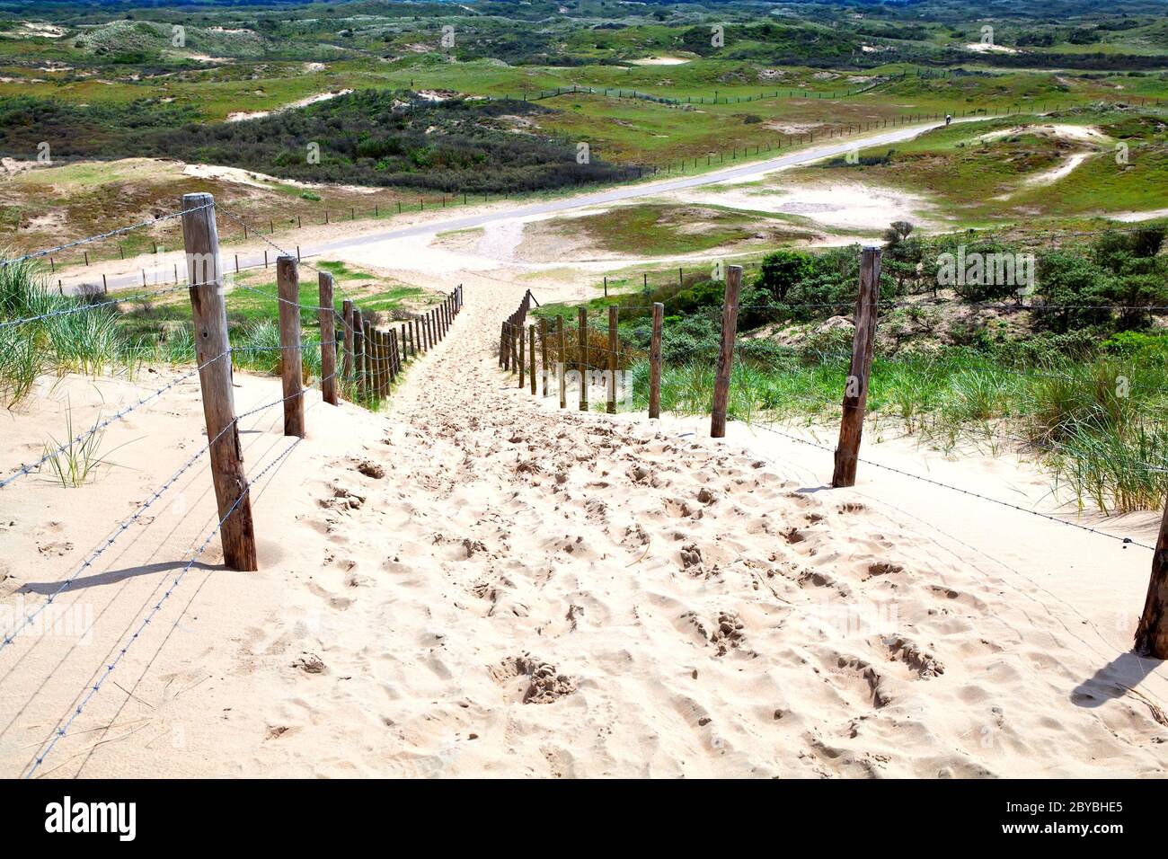 fence by sand path to dunes Stock Photo - Alamy
