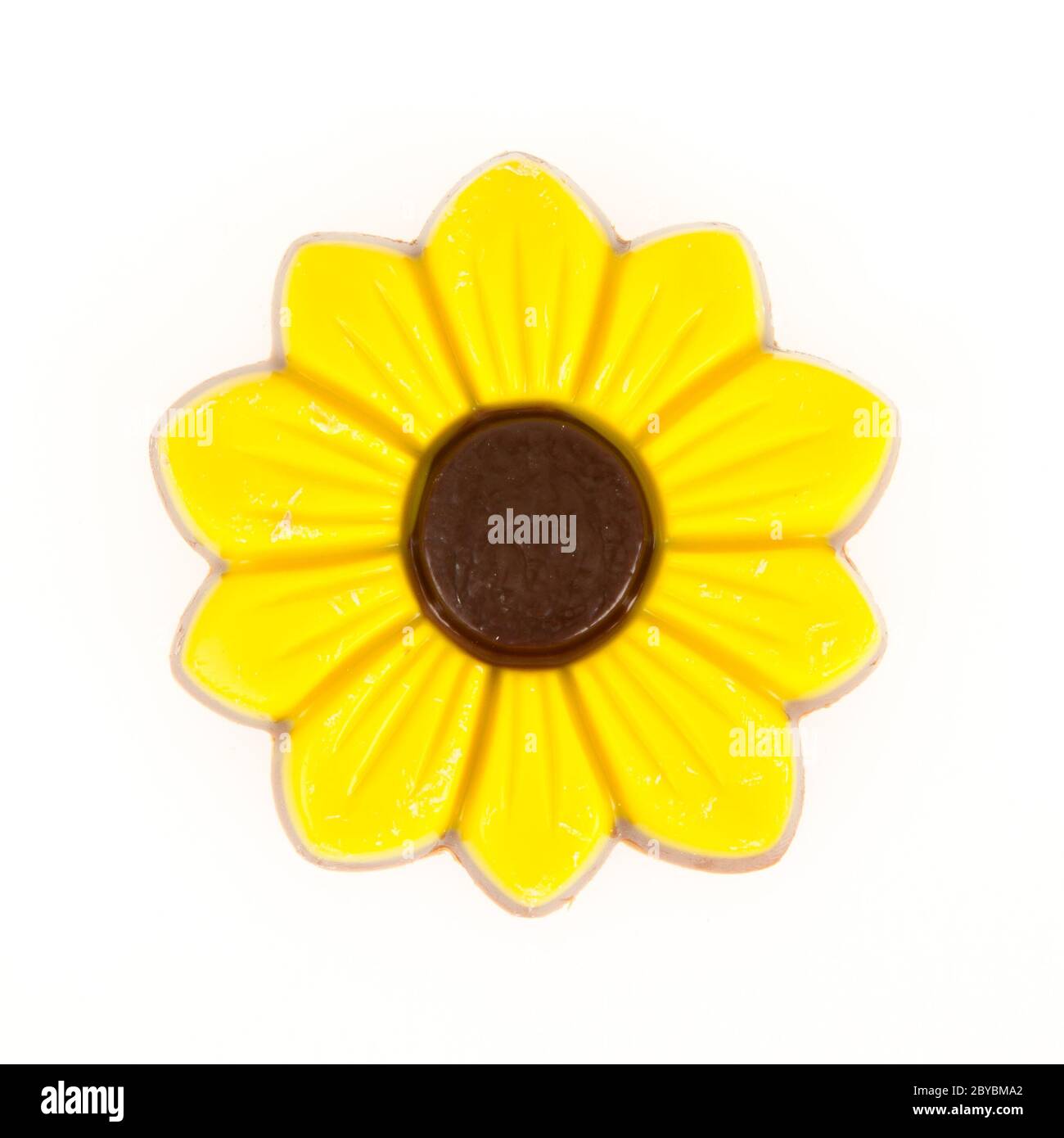 Yellow chocolate flower, isolated Stock Photo - Alamy