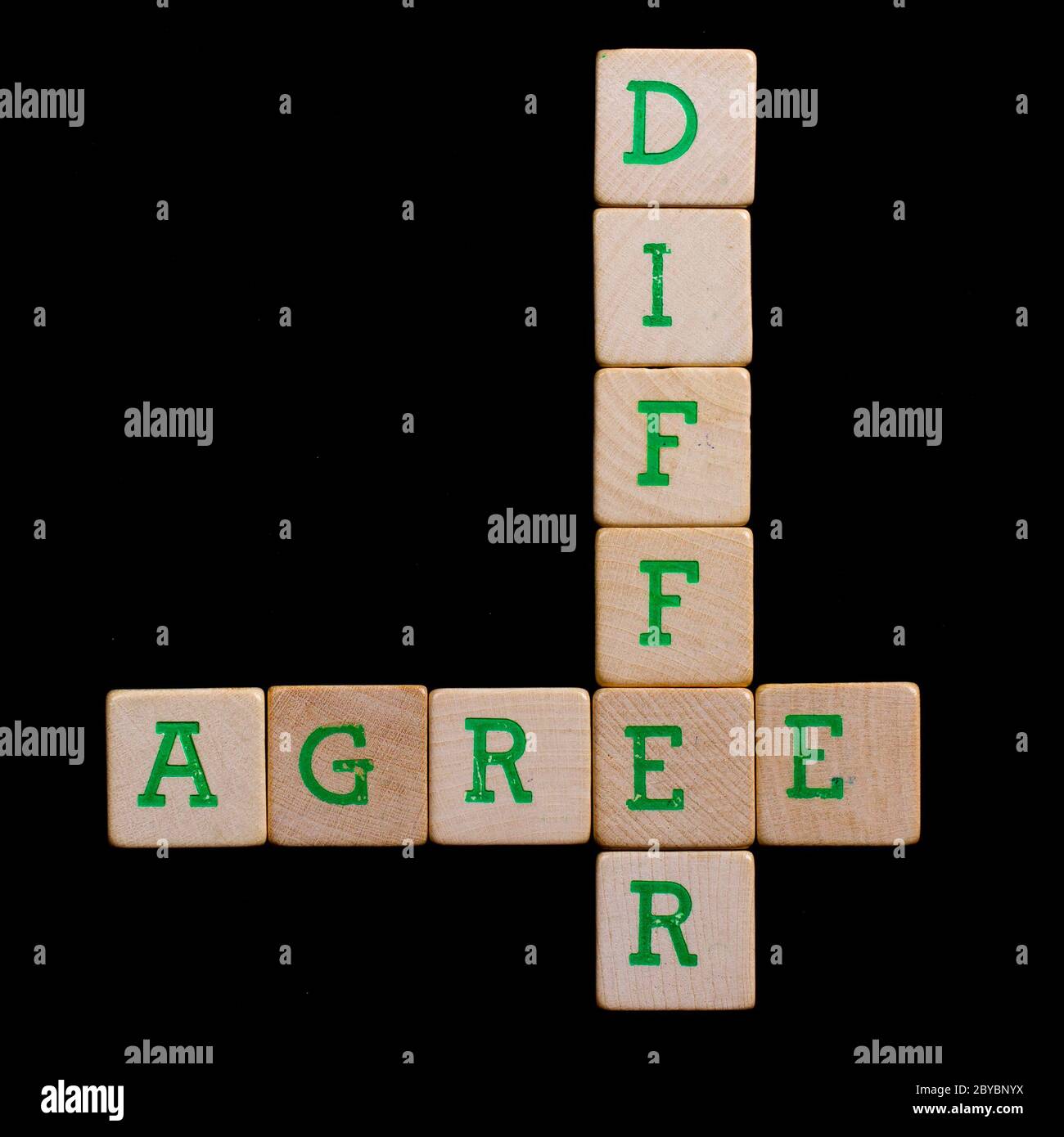 Letters on old wooden blocks (agree, differ Stock Photo - Alamy