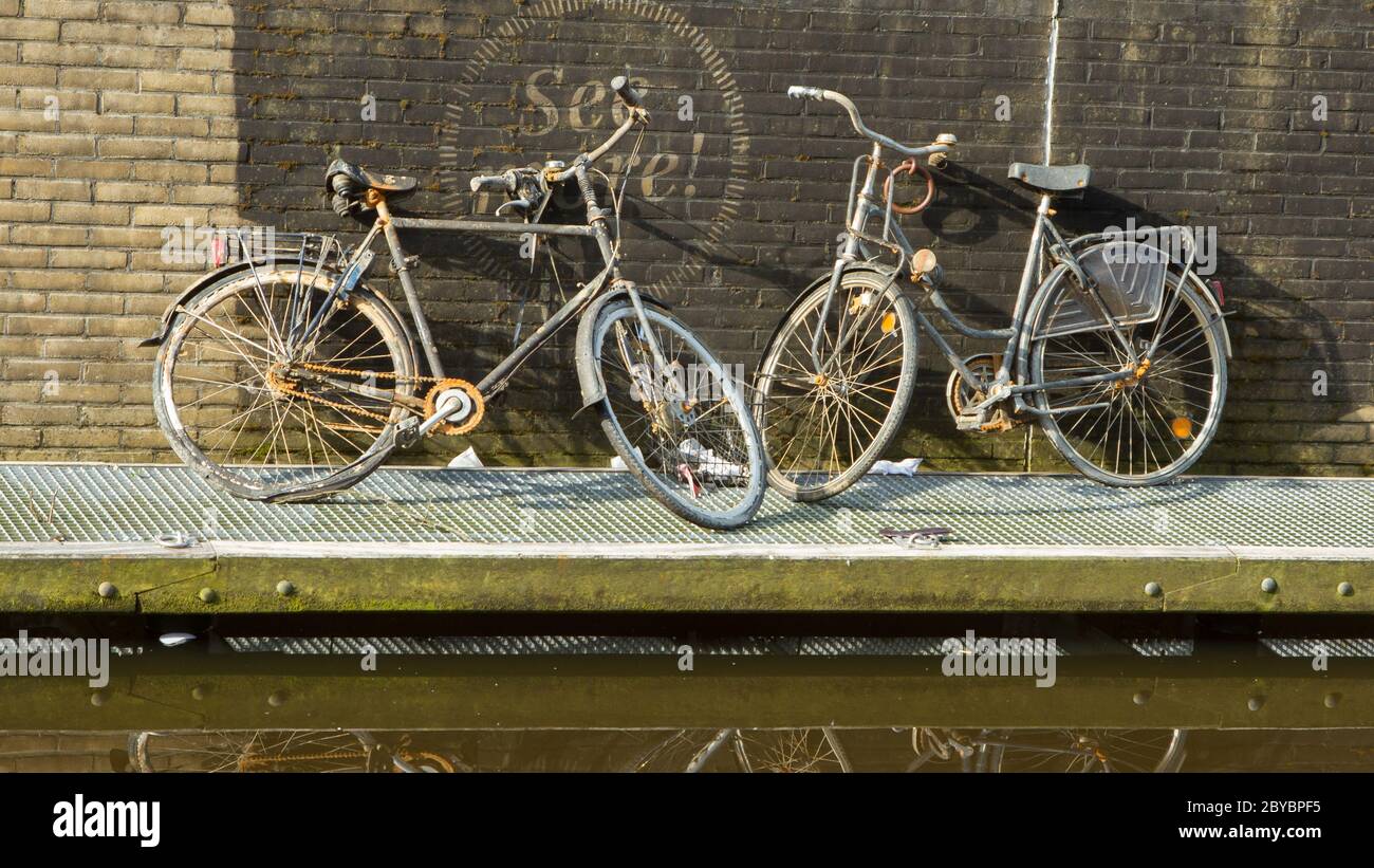 Two rusted bicycles Stock Photo - Alamy