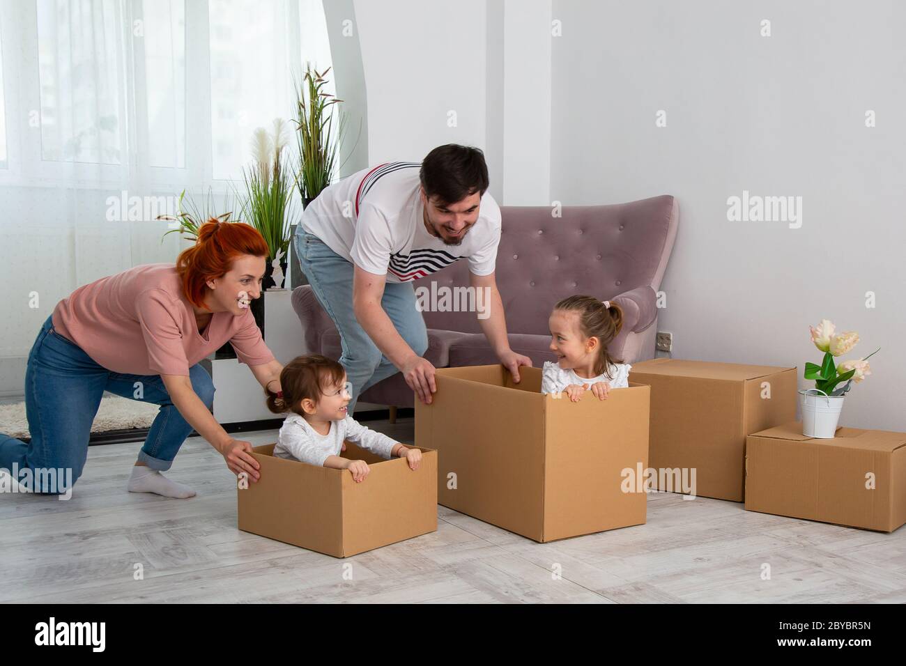 Children playing with boxes hi-res stock photography and images - Alamy