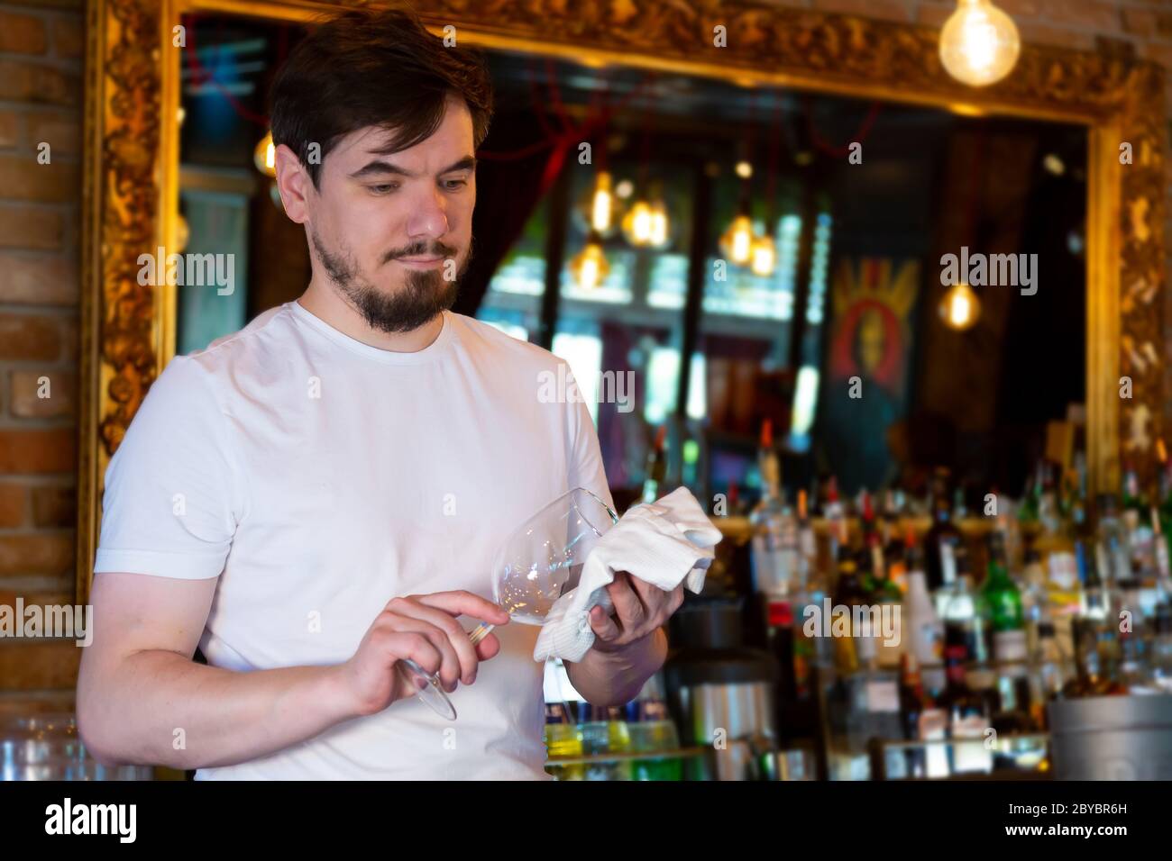 Waiter cleaning the glass hi-res stock photography and images - Alamy