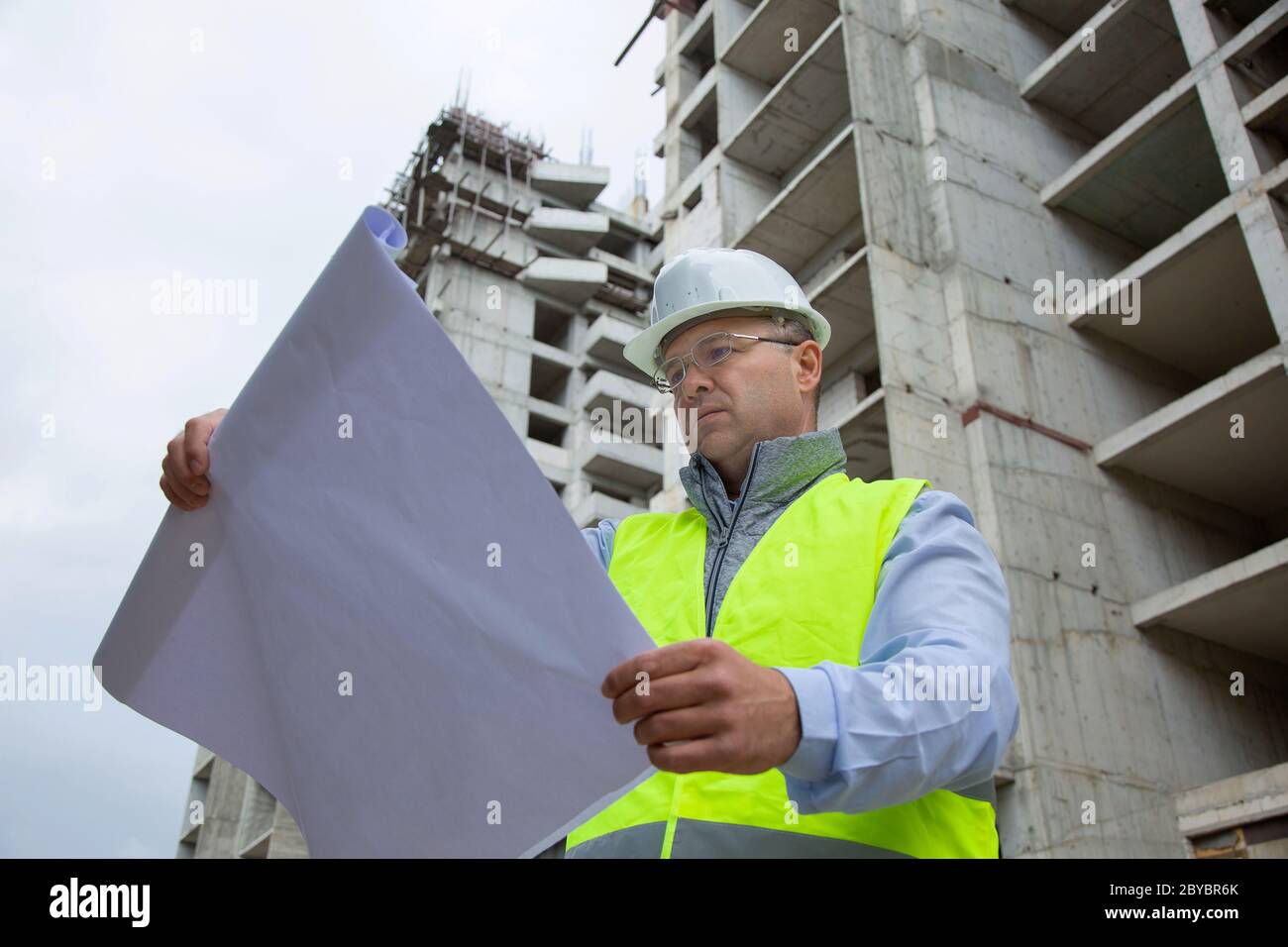 Engineer working on blueprint check hi-res stock photography and images ...