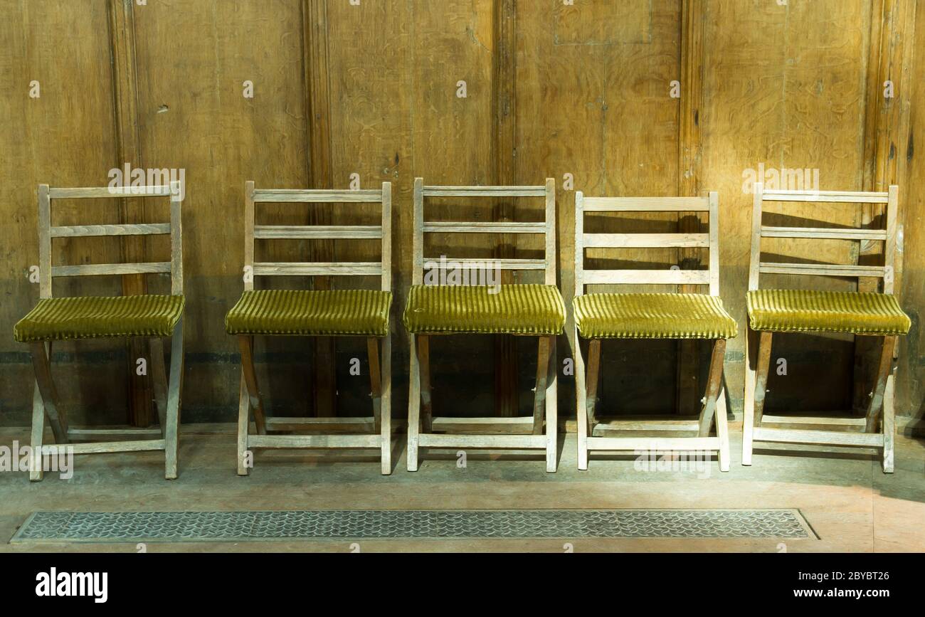 Row of very old chairs Stock Photo - Alamy