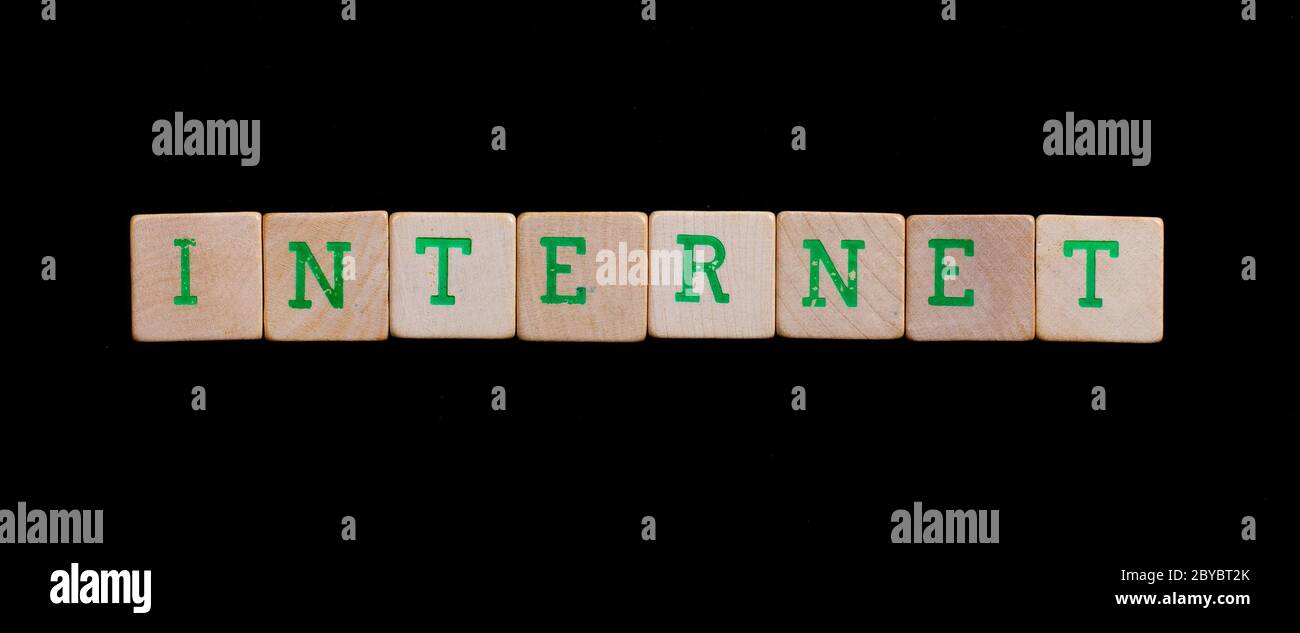 Letters on old wooden blocks (internet Stock Photo - Alamy