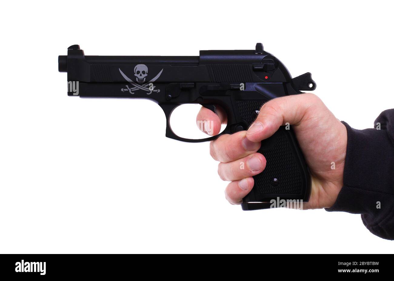 Pistol in hand Stock Photo - Alamy