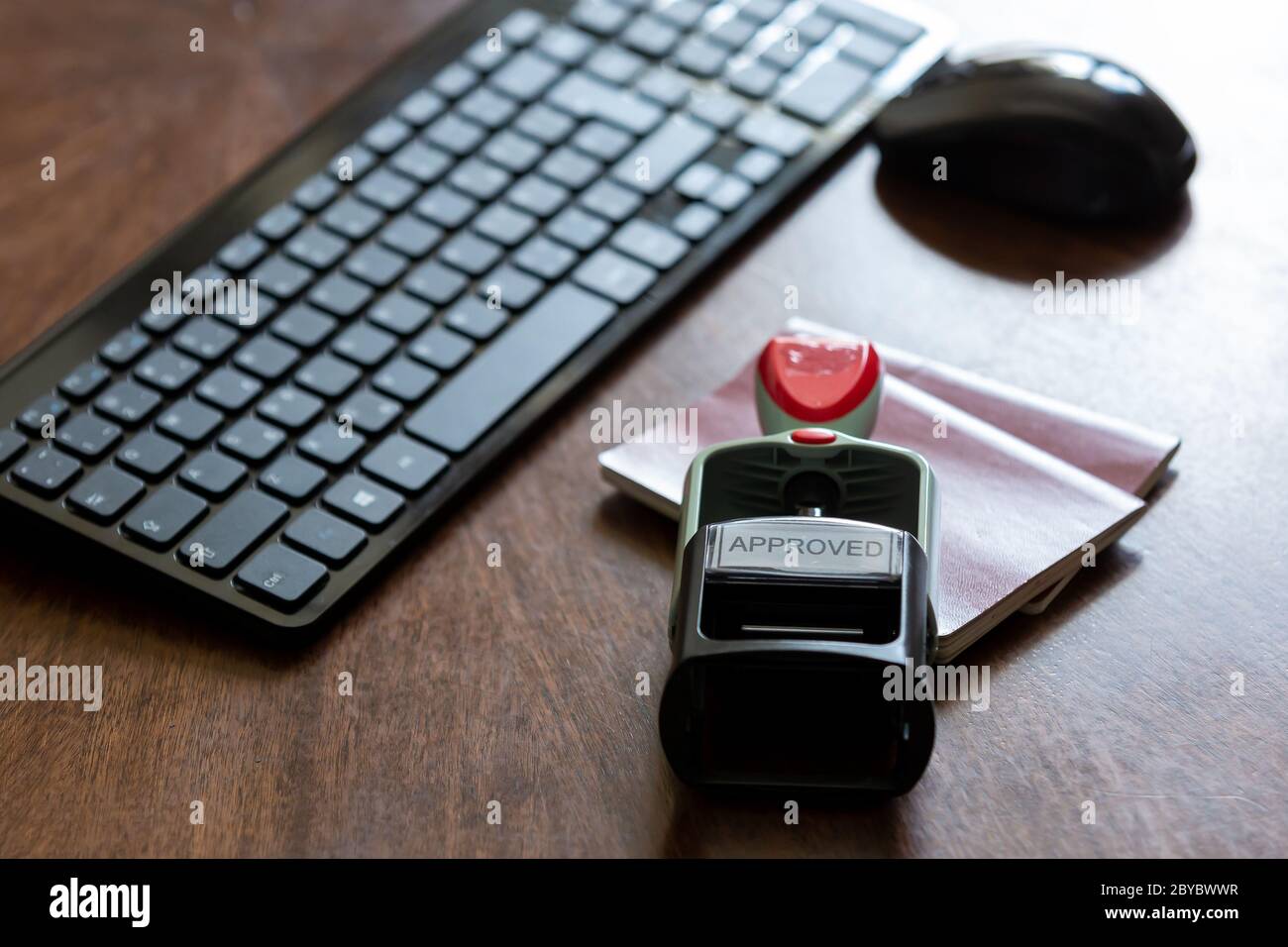 The approval stamp placed over the passports at the customs office ...